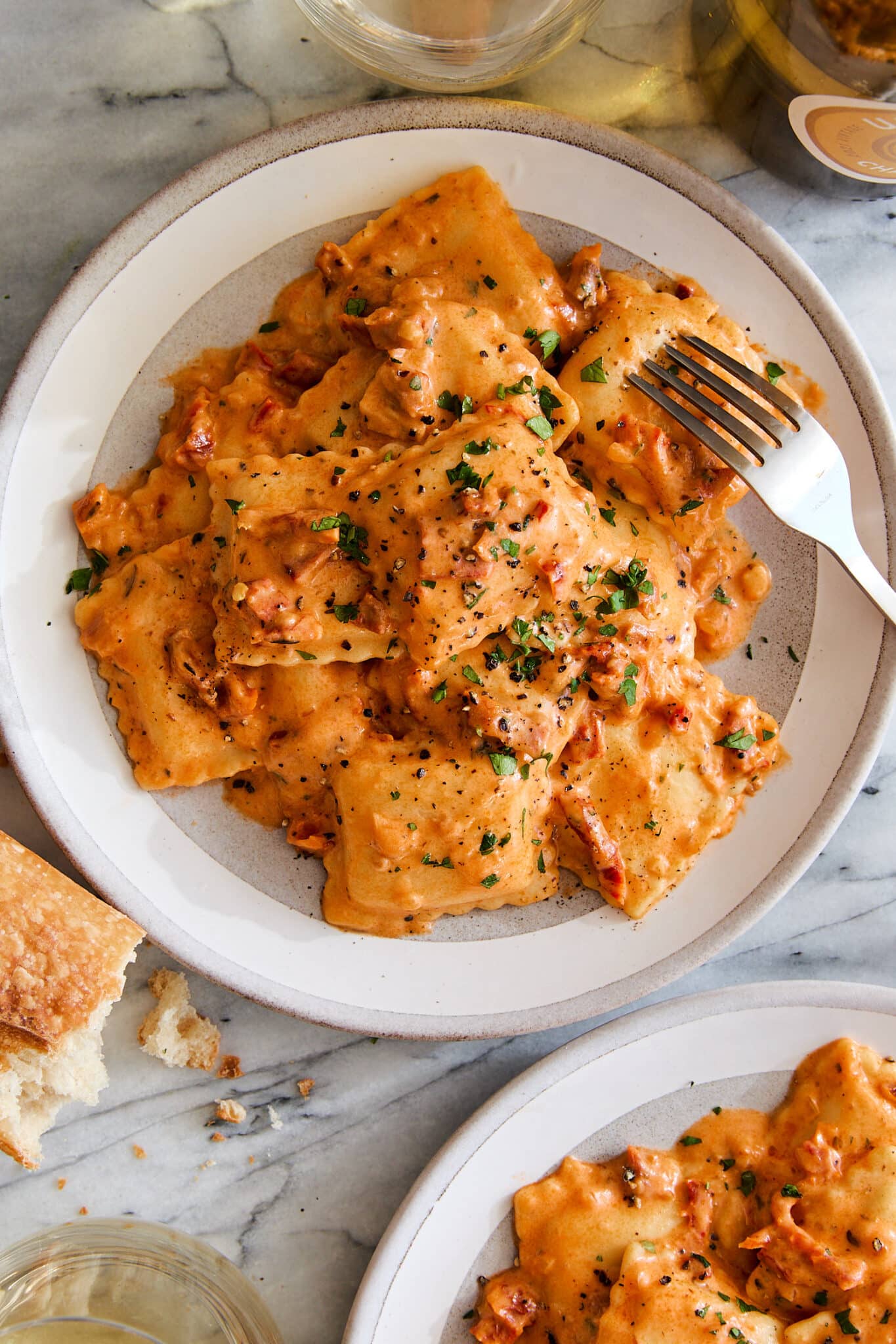 Ravioli with Sun Dried Tomato Cream Sauce - Damn Delicious